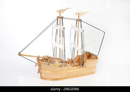 A child's wooden sailing ship toy Stock Photo - Alamy