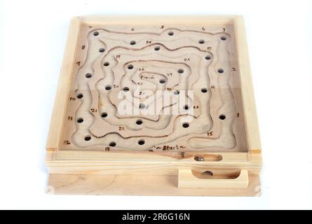 A home-made wooden labyrinth toy Stock Photo - Alamy