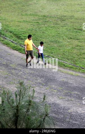 Divorced single dad plays sports together with his dark-haired Latino ...