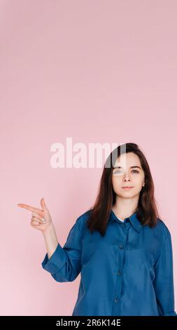 Photo of pretty lady direct finger side empty space wear red crop top ...