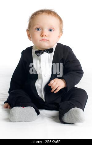 Chic cute kid in tails with bow tie Stock Photo - Alamy