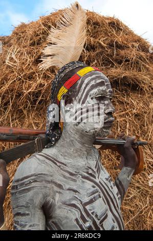 Karo warrior with body painting and rifle, Omo Valley, Southern ...