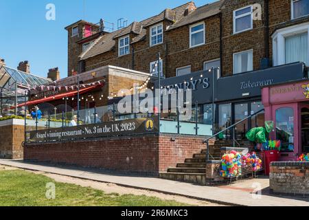 fish and chip chips shop shops que ques outside people queuing ...