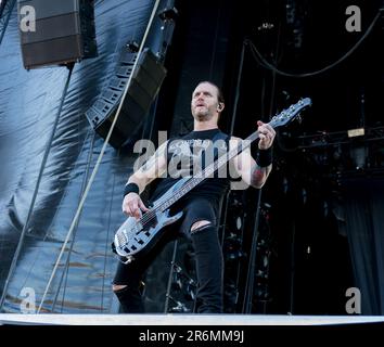 Bass guitarist Brian Marshall of rock band Creed performs on stage ...