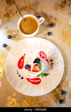 top view creative serving of coke mousse dessert in a restaurant Stock ...
