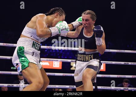 Cherneka Johnson (left) hits out at Ellie Scotney during the IBF Super ...