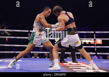 Ellie Scotney (right) hits out at Cherneka Johnson during the IBF Super ...