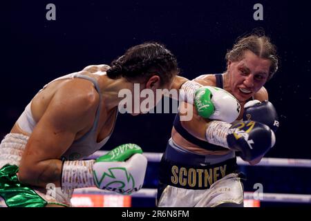 Ellie Scotney (right) hits out at Cherneka Johnson during the IBF Super ...
