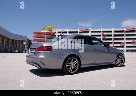 Mercedes E class backside in front of airplane background Stock Photo ...