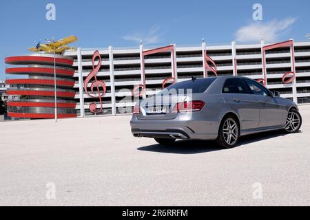 Mercedes E class backside in front of airplane background Stock Photo ...