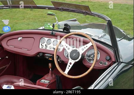 Steering wheel and dashboard of a Daimler Dart SP250 sports car ...