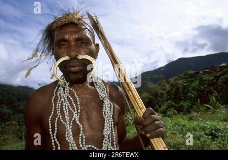 Yali hunter with bow and arrow, West Papua, West New Guinea, Irian-Jaya ...