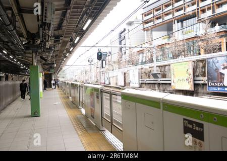 Editorial use only JR Yamanote line train approaching the platform at ...