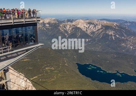 ZUGSPITZE, GERMANY - SEPTEMBER 4, 2019: Eibsee Lake station of aerial ...