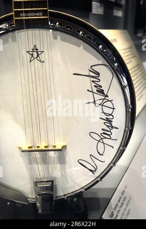 An autographed banjo played by bluegrass music pioneer Dr. Ralph ...