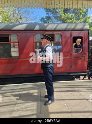 Vintage train station master example Stock Photo - Alamy