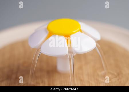 Yellow Automatic Pet Water Fountain Stock Photo - Alamy