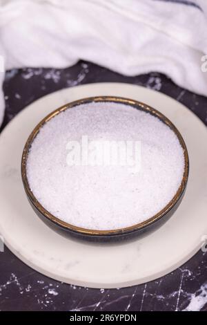 Non-iodized salt on dark background. Natural minaret non-iodized ...