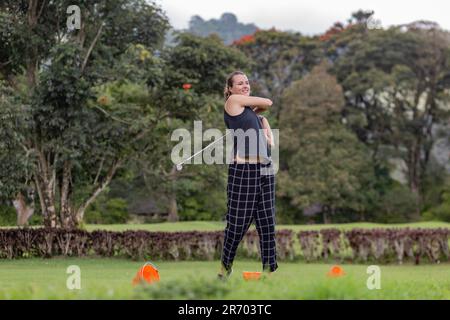Woman playing golf, Bedugul, Bali, Indonesia Stock Photo - Alamy