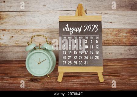 2023 Desk calender with alarm clock, keyboard computer, pen, plant pot ...