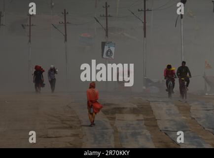 Prayagraj, India. 12/06/2023, Indian people brave heat wave condition ...