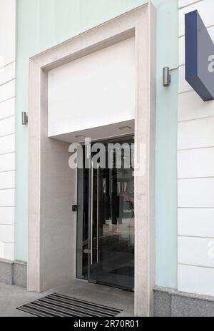 Glass partition mockup and modern doors in hall Stock Photo - Alamy