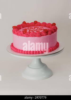 frosted icing elegnt cake with funny lettering topping. Mothers day ...