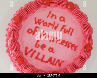 Pink frosted icing elegnt cake with funny lettering topper. Celebration ...