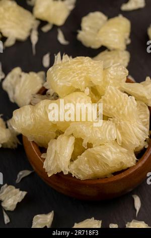 peeled and divided into small pieces ripe pale yellow pomelo, sweet ...