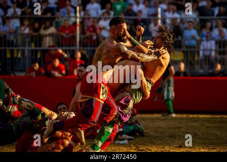 FLORENCE, ITALY, JUNE 11th - A red player in a direct confrontation ...