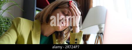 Frustrated woman putting hand to forehead and closed eyes Stock Photo ...