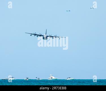 The amazing Hercules flying over the ocean Stock Photo - Alamy