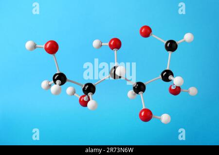 Molecule of glucose on light blue background, closeup and space for ...