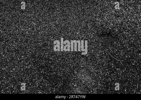 Metal shavings on the surface of lathe, close up. Turned metal ...