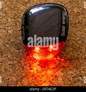 Solar charged bicycle rear red light cut out on white background Stock ...