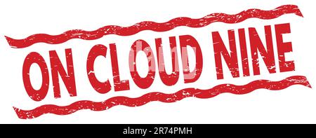 ON CLOUD NINE text written on blue lines stamp sign Stock Photo - Alamy