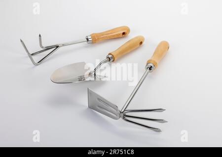 Double hoe with wooden handle, white background Stock Photo - Alamy