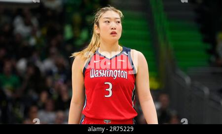 Washington Mystics guard Li Meng (3) works to shoots as Dallas Wings ...