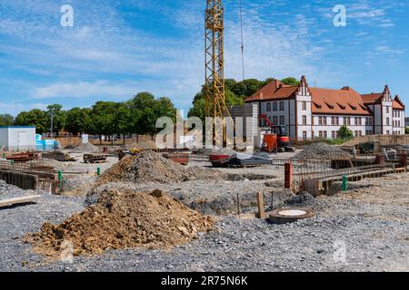 The beginning of house foundation construction: digging deep trenches ...