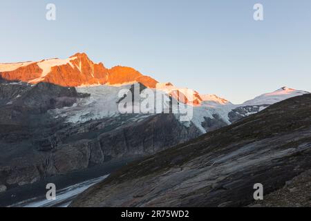 Waterfall angle with Großglockner, north side of the peak, creek Stock ...