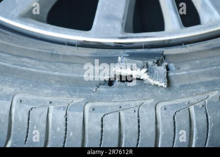 broken tire on magnesium alloy wheel from accident Stock Photo - Alamy