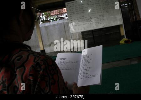 June 13, 2023, Yogyakarta, Yogyakarta, Indonesia: A woman attends a ...