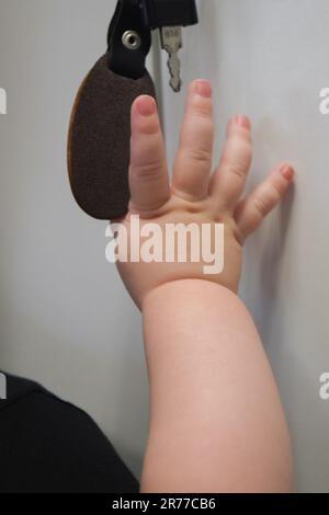 baby hand reaching for keys Stock Photo - Alamy