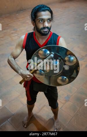 Performer demonstrates traditional Indian martial arts at the ...