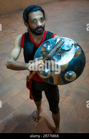 Performer demonstrates traditional Indian martial arts at the ...