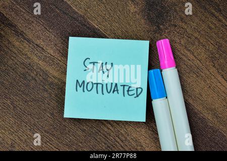 Concept of Positivity is Power write on sticky notes isolated on Wooden ...