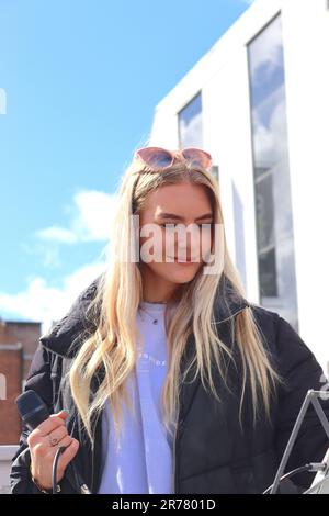 Nancy Longland a soprano singer and street performer, sings live to ...