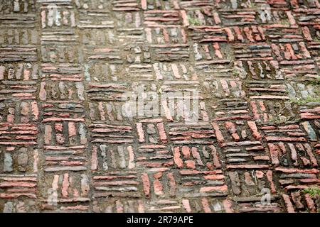 Old indian brickwork in Agra red fort, masonry walkway covered with ...