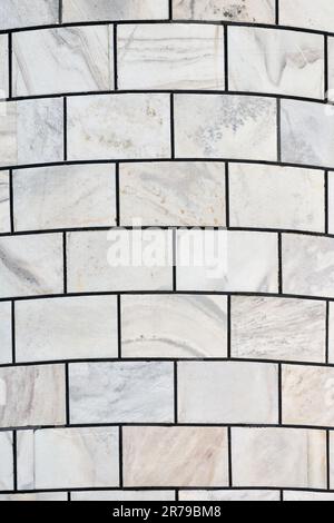 White marble bricks of Taj Mahal minaret towers, close up ivory white ...