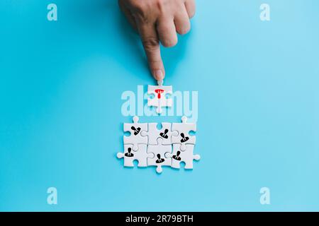 image of puzzle with people icons over wooden table ,human resources ...